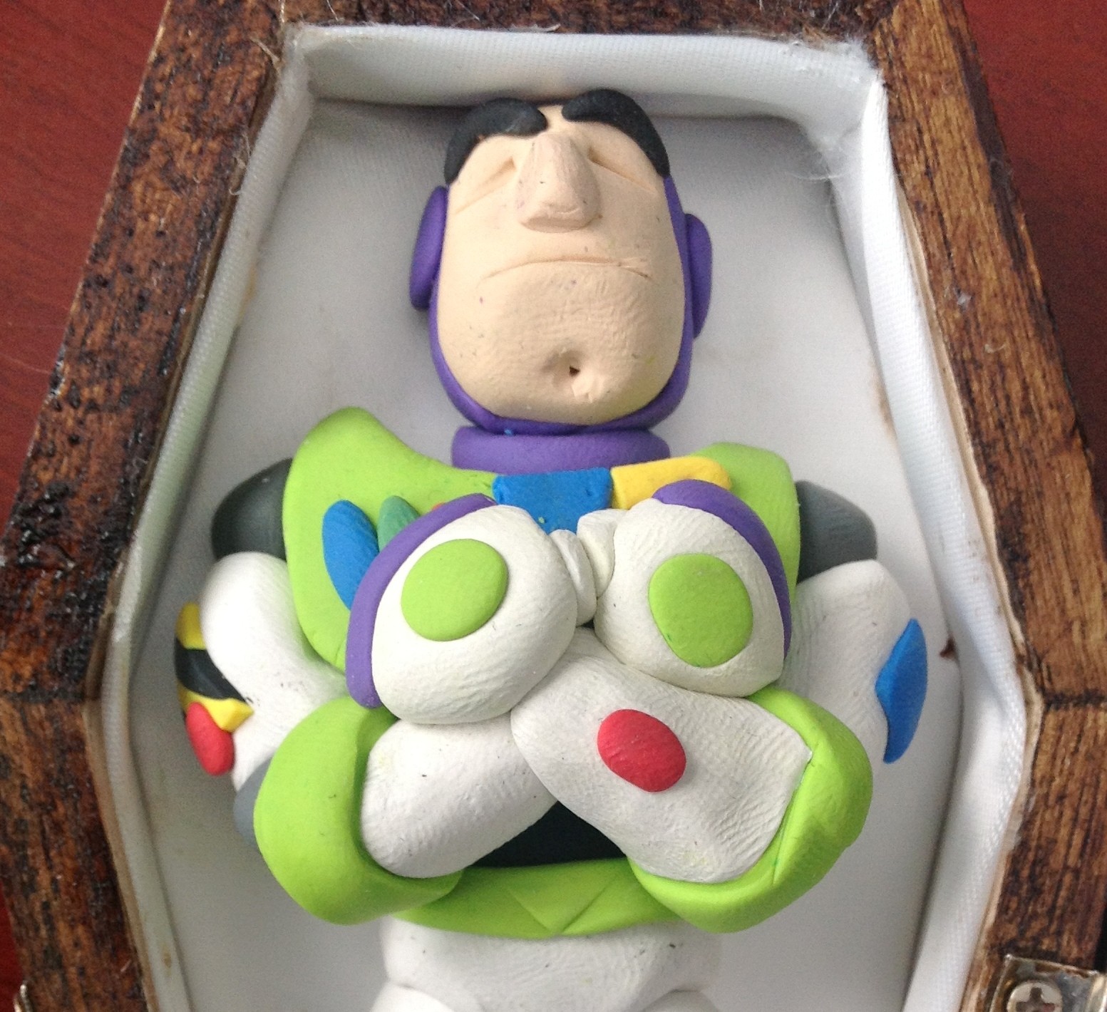 ArtStation - Dead Buzz Lightyear in Coffin
